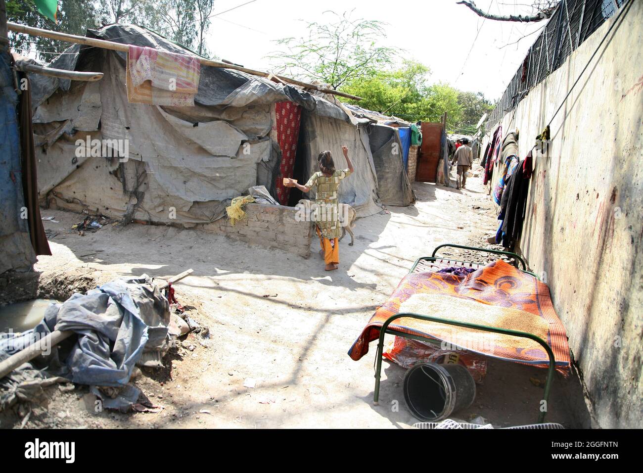 A general view of a slum area near Shakurbasti Railway station in New ...