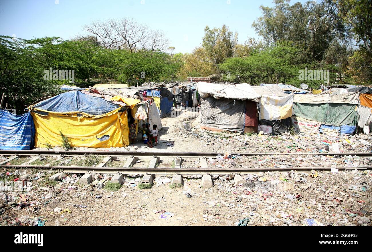 A general view of a slum area near Shakurbasti Railway station in New ...