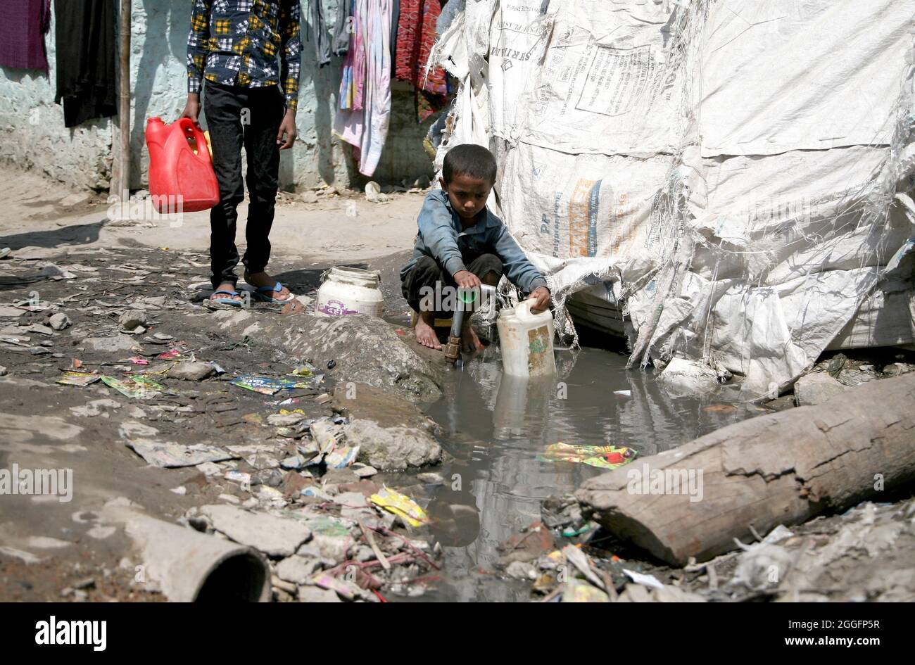 A general view of a slum area near Shakurbasti Railway station in New ...