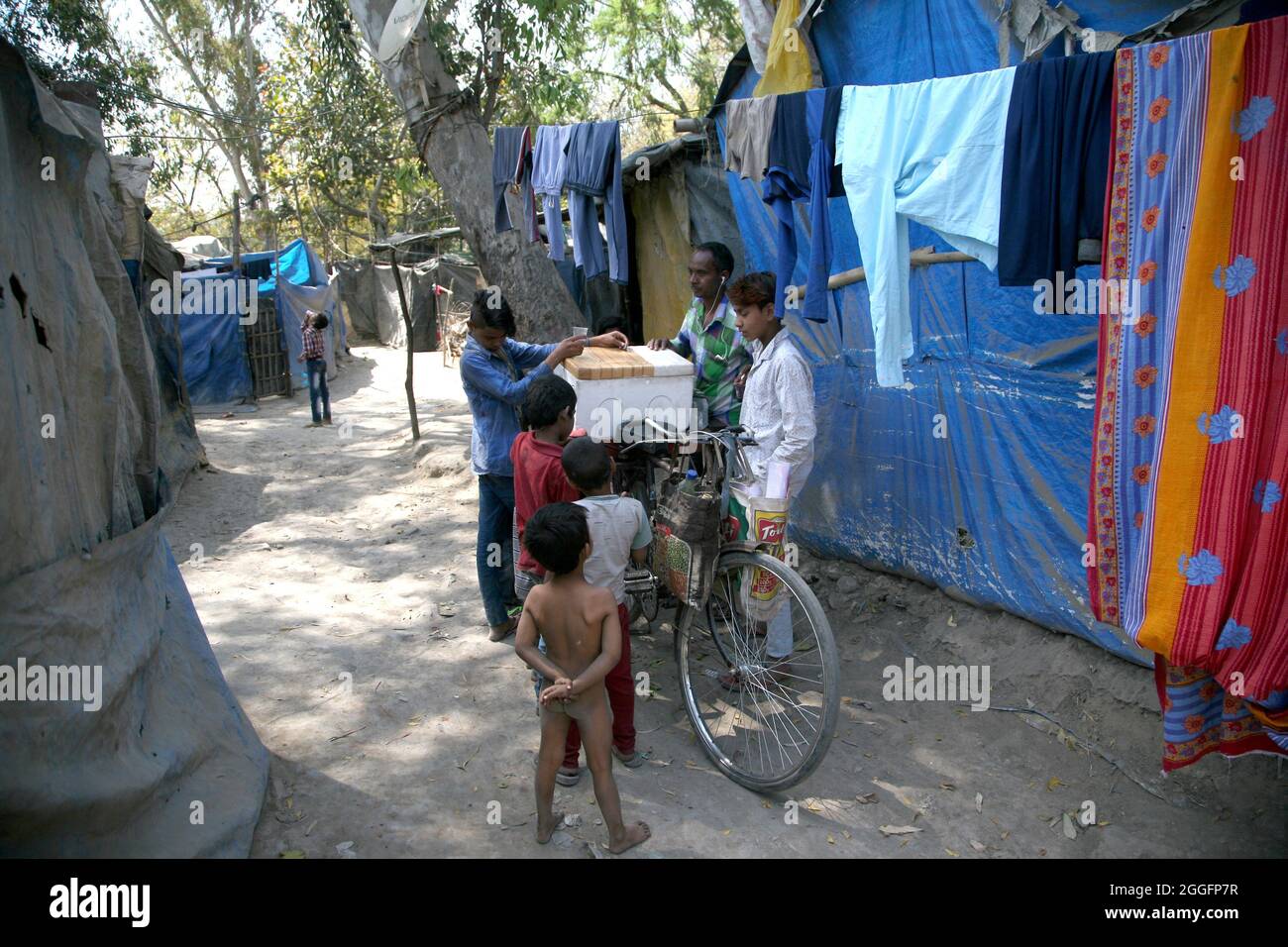 A general view of a slum area near Shakurbasti Railway station in New ...