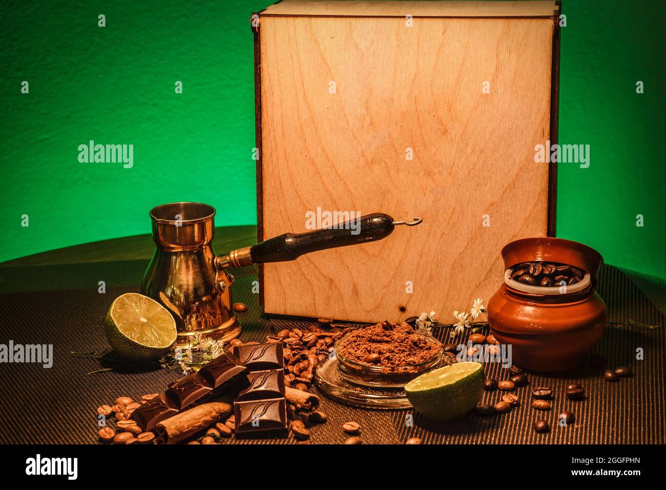 Creative coffee composition with armenian coffee maker jazzve, lime ...