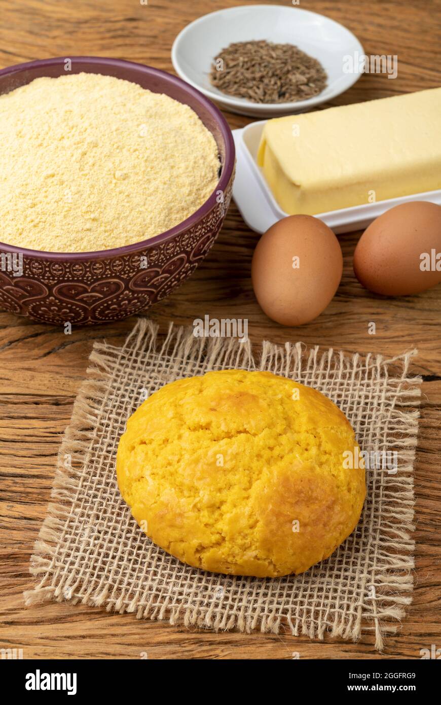 Broa, typical brazilian corn flour bread with ingredients. Butter, eggs ...