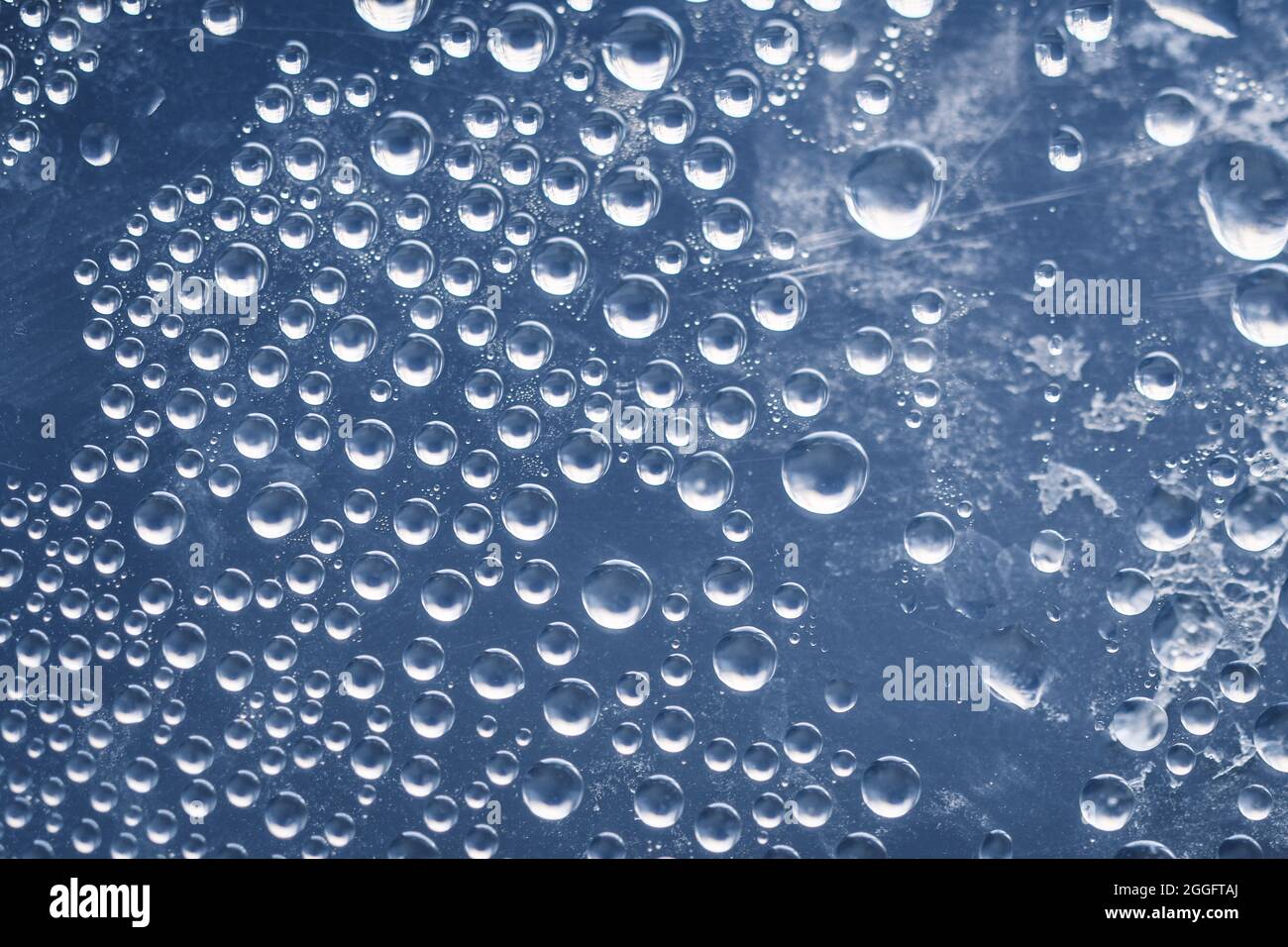 Closeup macro background photo of small water drops Stock Photo - Alamy