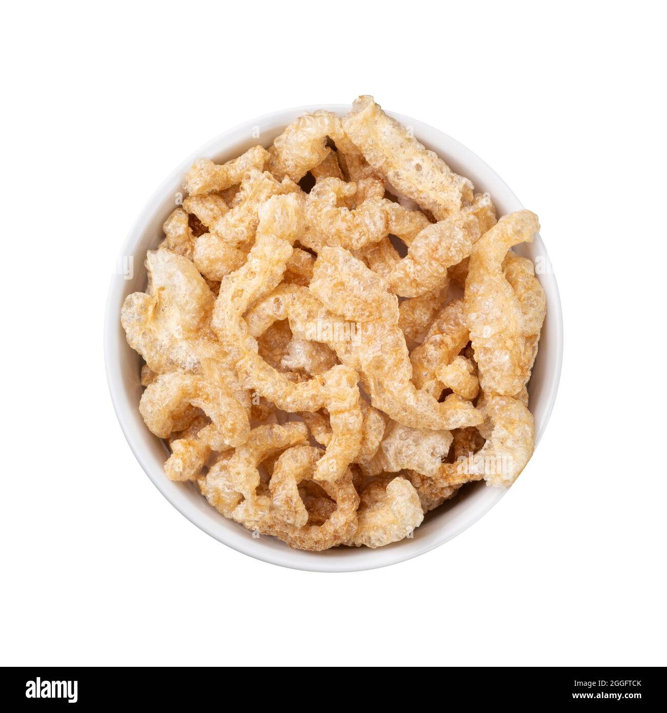 Fried pork cracklings on a bowl isolated over white background Stock ...