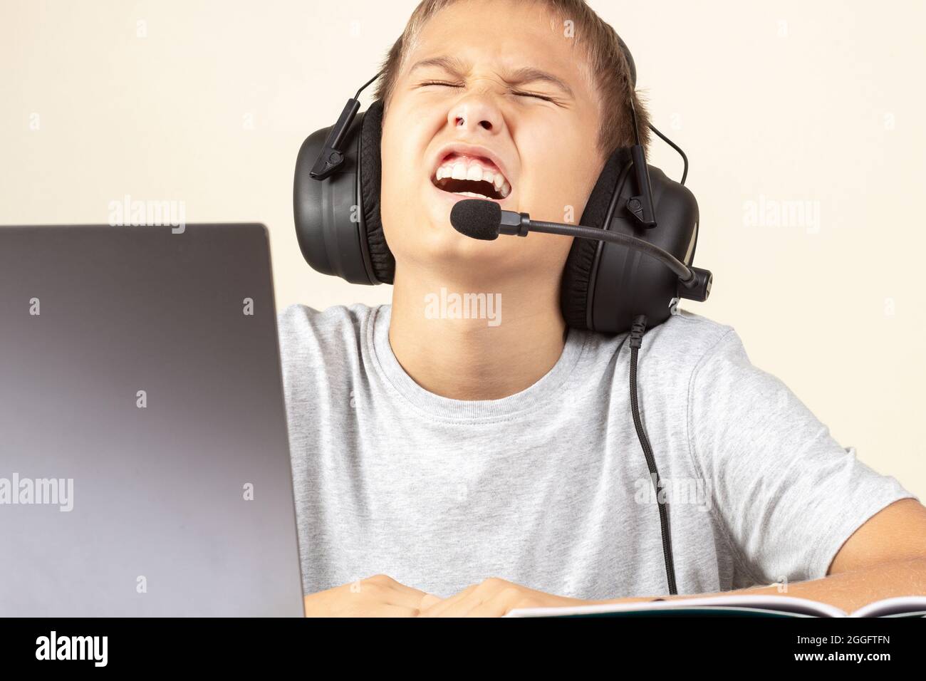 Sad teen boy computer hi-res stock photography and images - Alamy