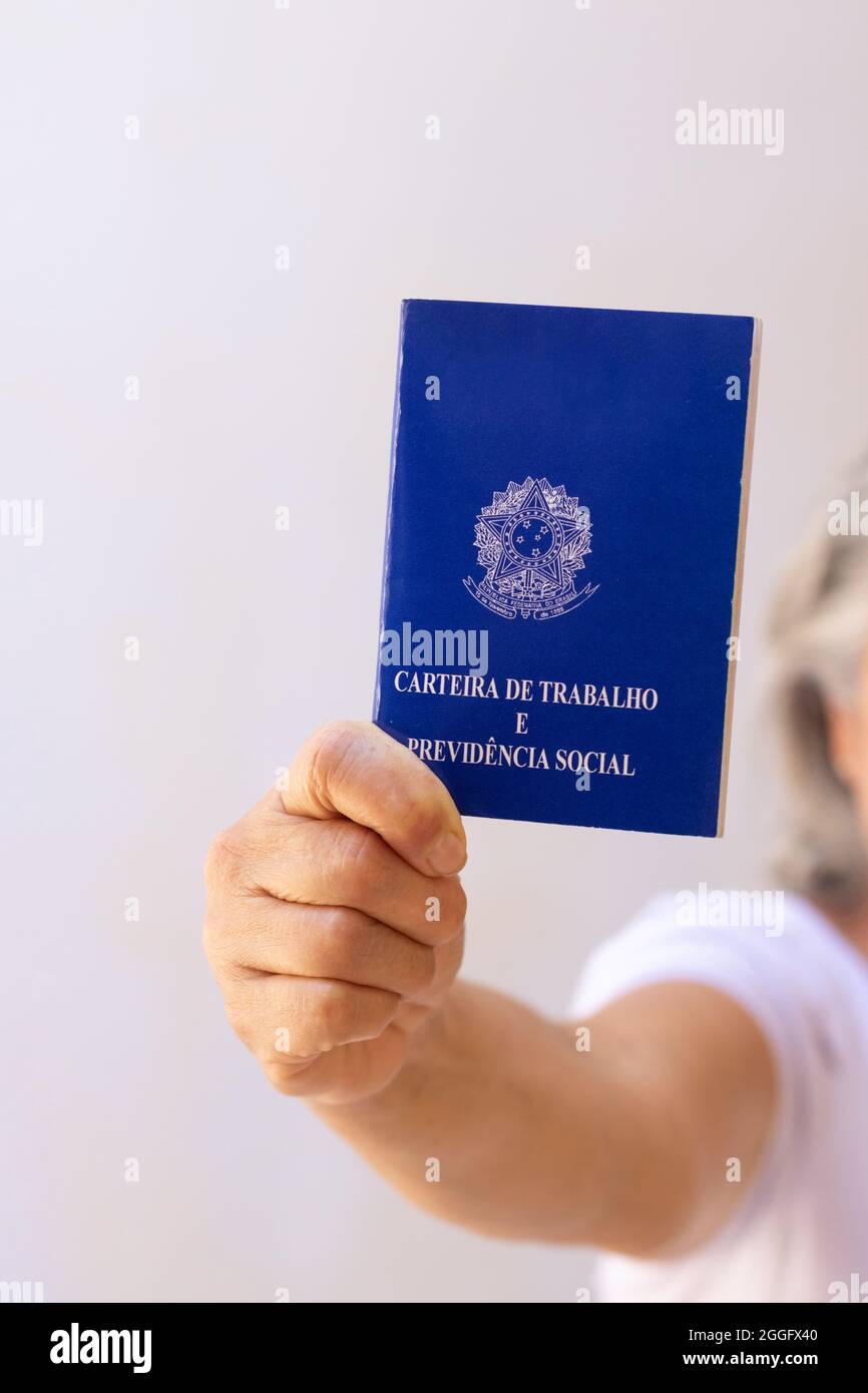 Holding a brazil work permit card, isolated on white background Stock ...