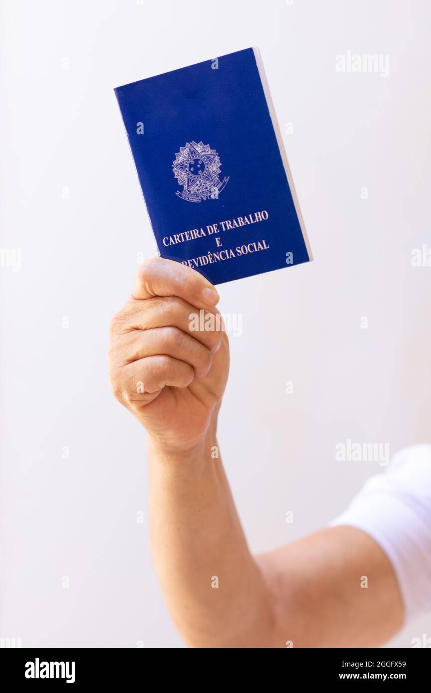 Holding a brazil work permit card, isolated on white background Stock ...