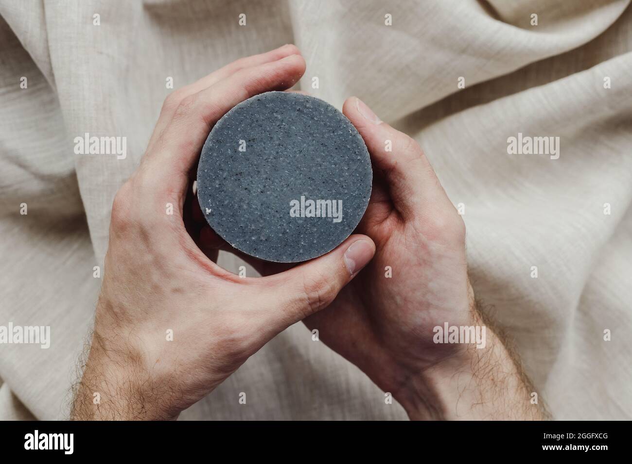 Men hands with natural soap, closeup Stock Photo - Alamy