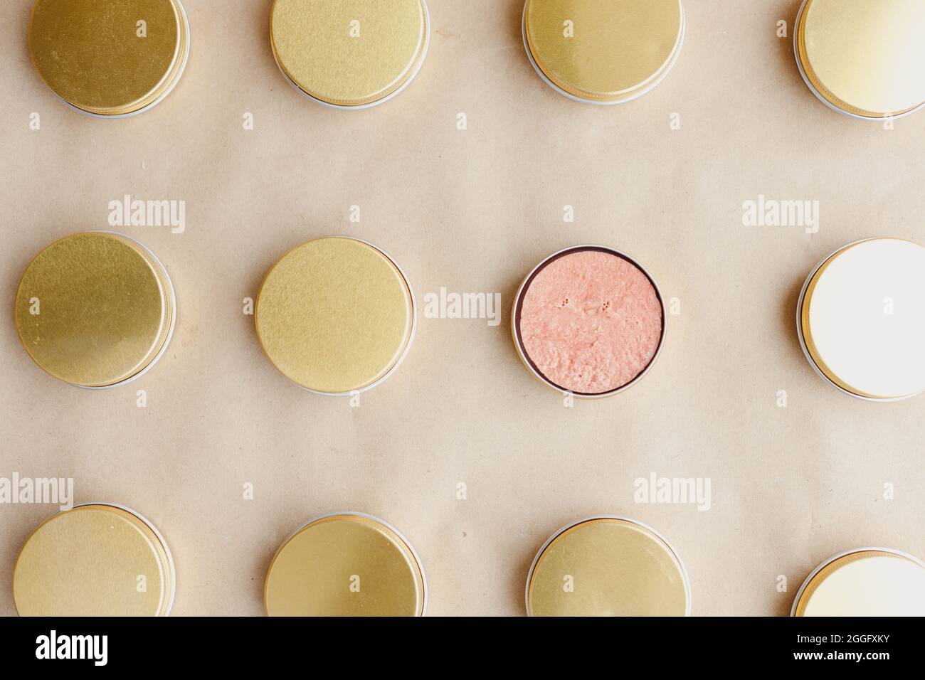 Eco friendly natural solid shampoo in metal cans on papaer background ...