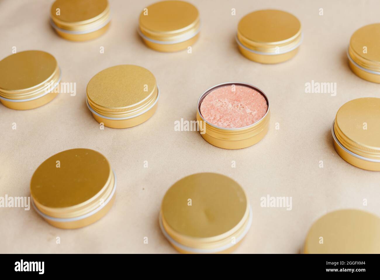 Eco friendly natural solid shampoo in metal cans on papaer background ...