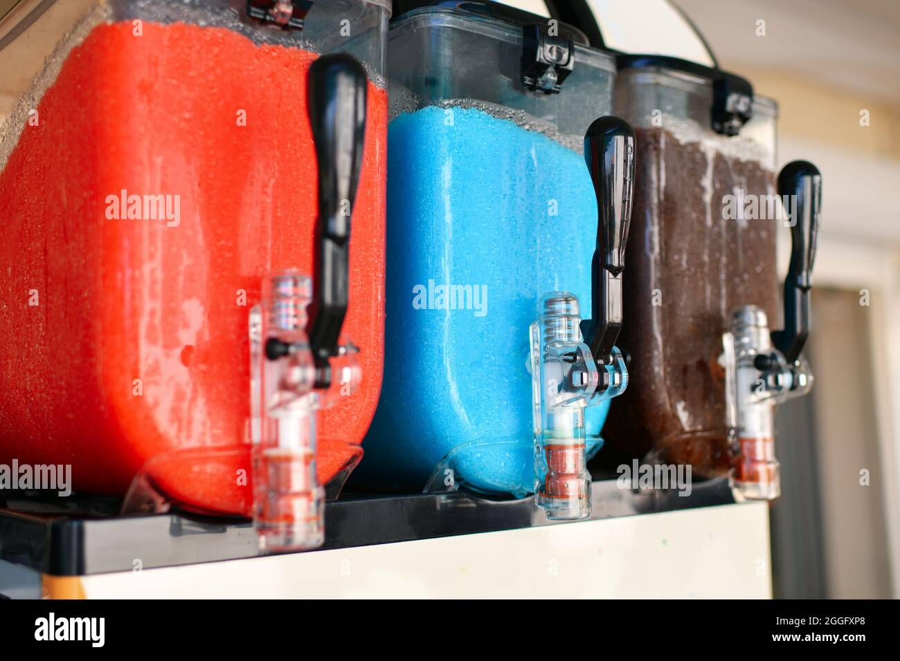 Ice granite containers Summer drink Juice machine Stock Photo - Alamy