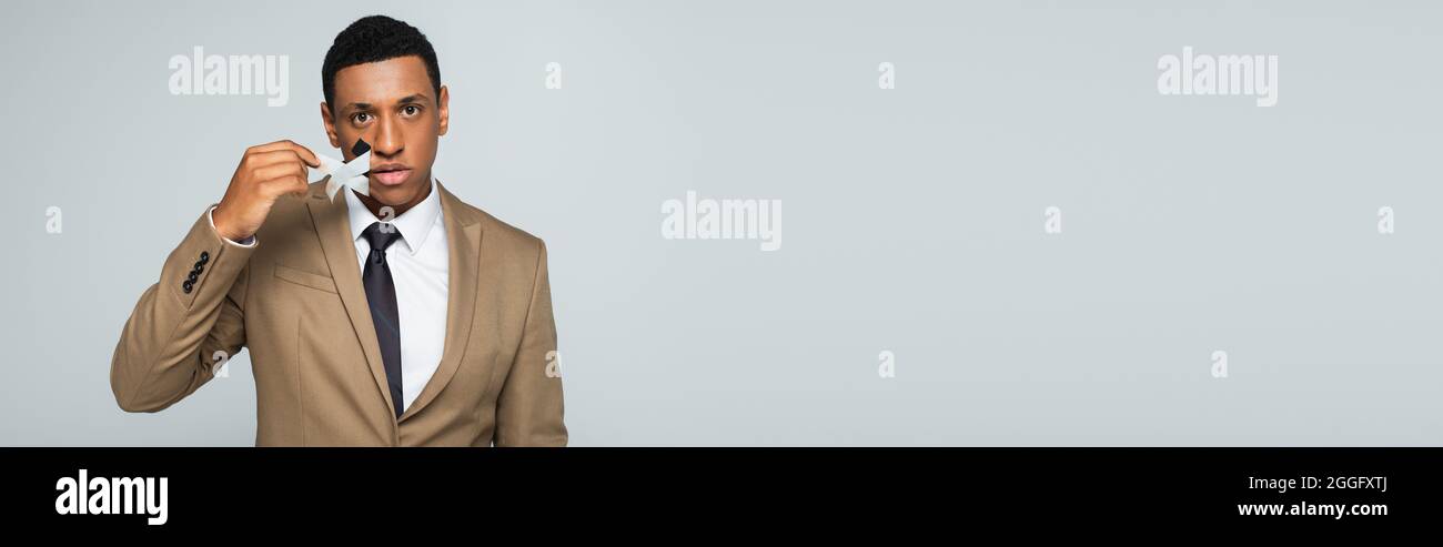 Young woman taking off black hi-res stock photography and images - Alamy