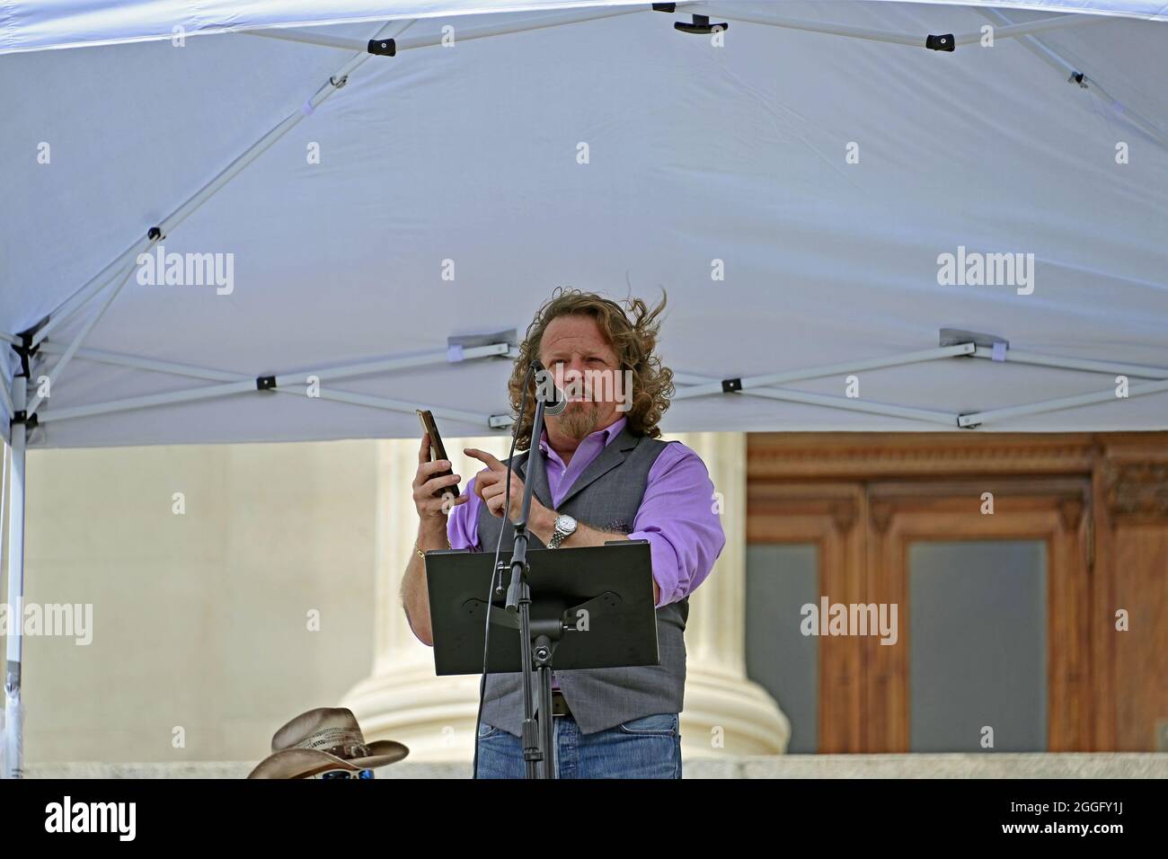 Conservative radio talk show host Jim Price addressing the crowd of ...
