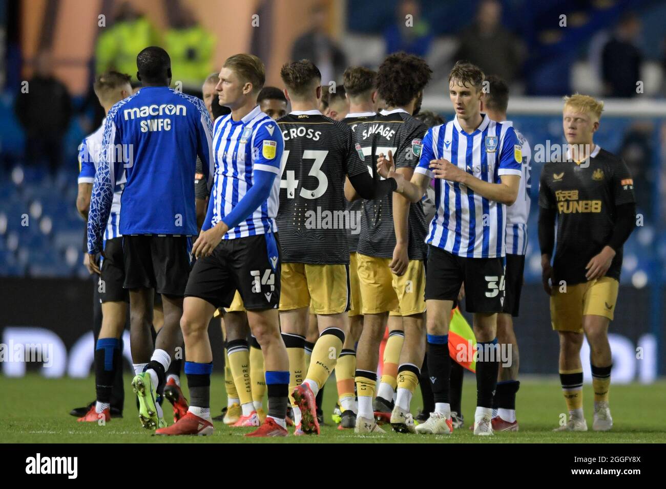 The players shake hands at the end of the game hi-res stock photography ...