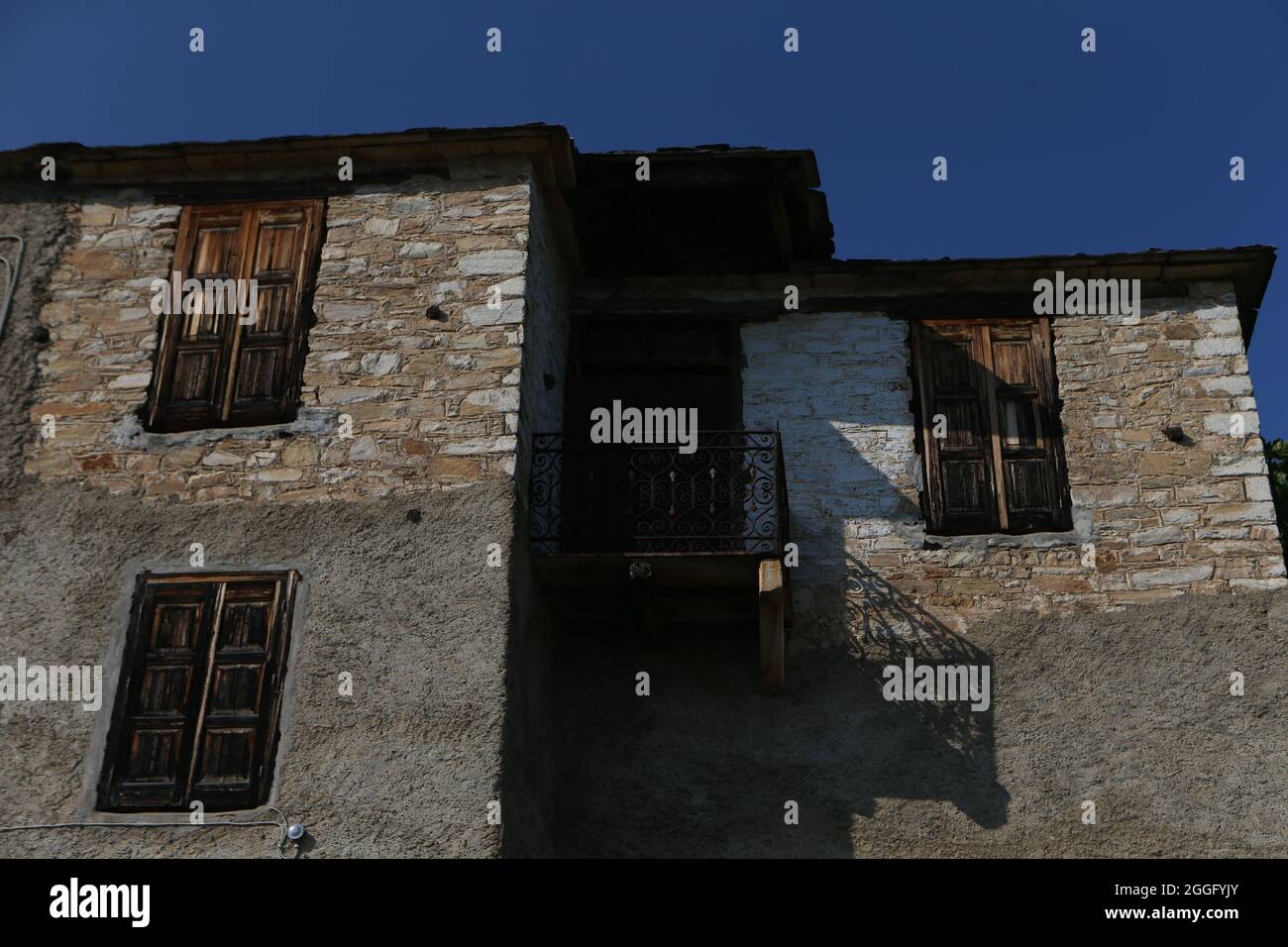 Street and houses view at Vizitsa village of Pelion, Greece Stock Photo ...