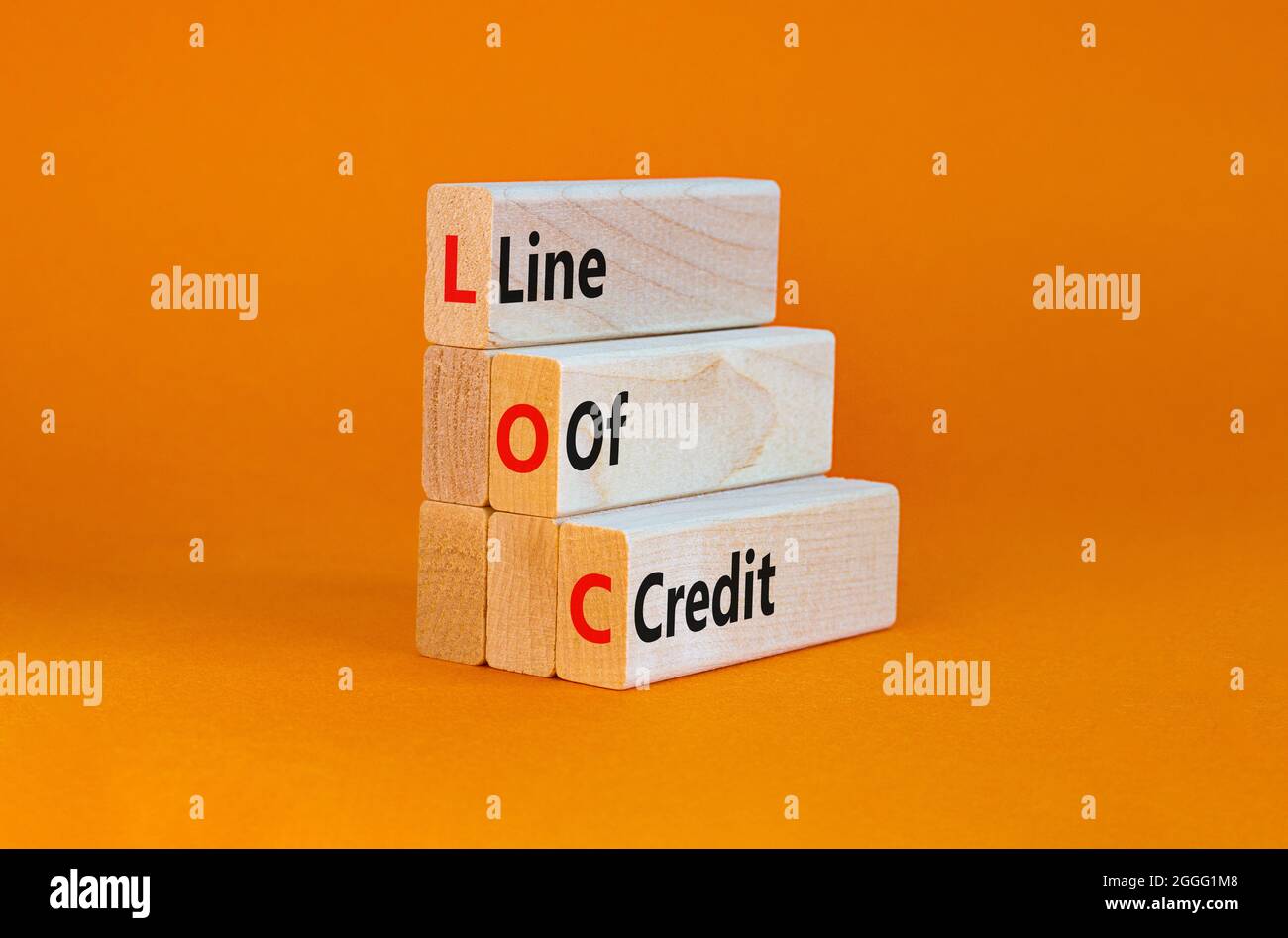 LOC, Line of credit symbol. Wooden blocks with words 'LOC, line of ...