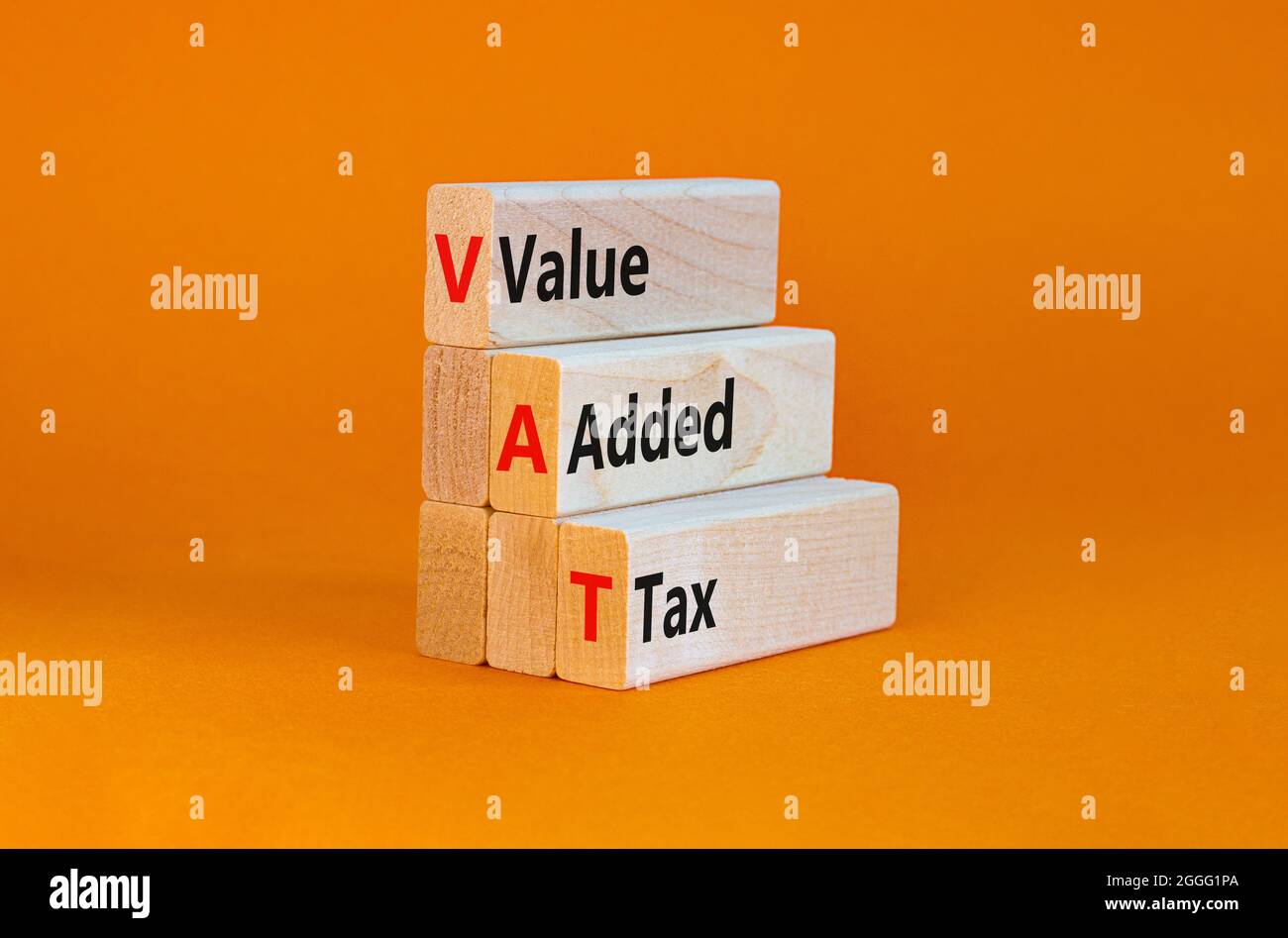 VAT, value added tax symbol. Wooden blocks with concept words 'VAT ...