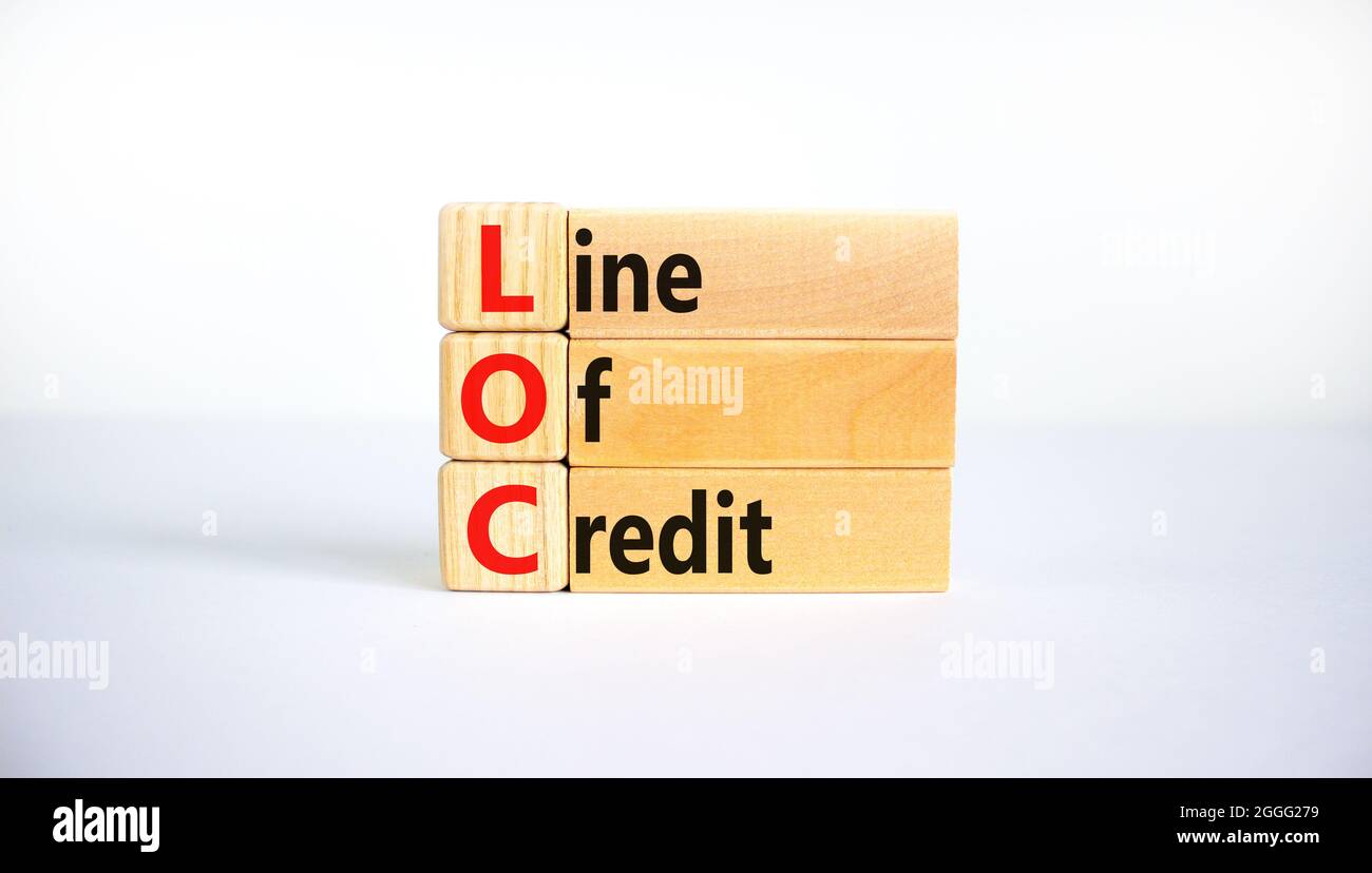 LOC, Line of credit symbol. Wooden blocks with words 'LOC, line of ...