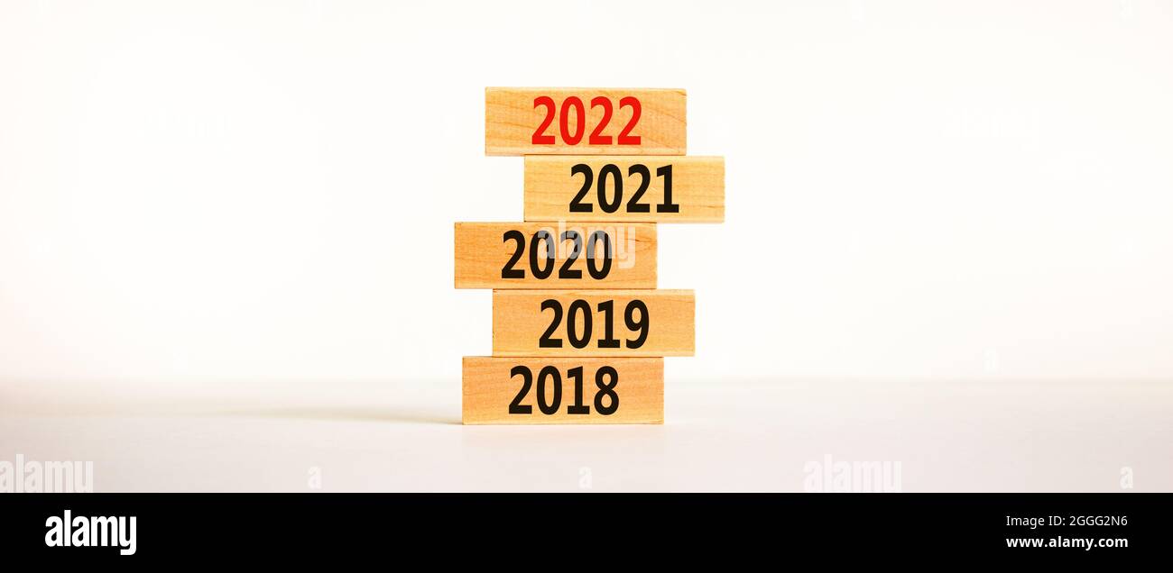 2022 happy new year symbol. Wooden block with number '2022'. Stack with ...