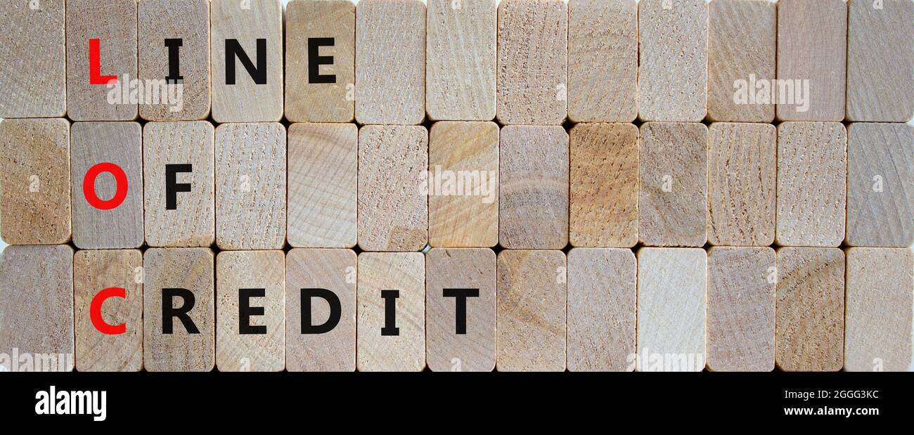 LOC, Line of credit symbol. Wooden blocks with words 'LOC, line of ...
