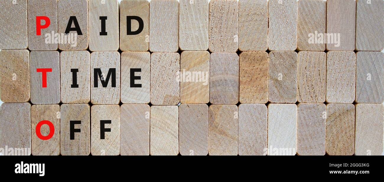 PTO, Paid time off symbol. Wooden blocks with concept words 'PTO, Paid ...