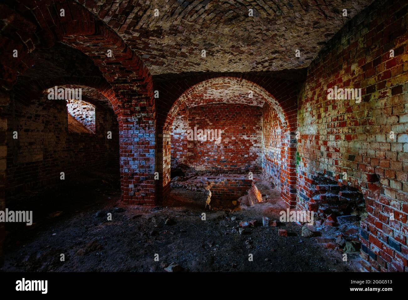 Vaulted red brick dungeon under old mansion Stock Photo - Alamy