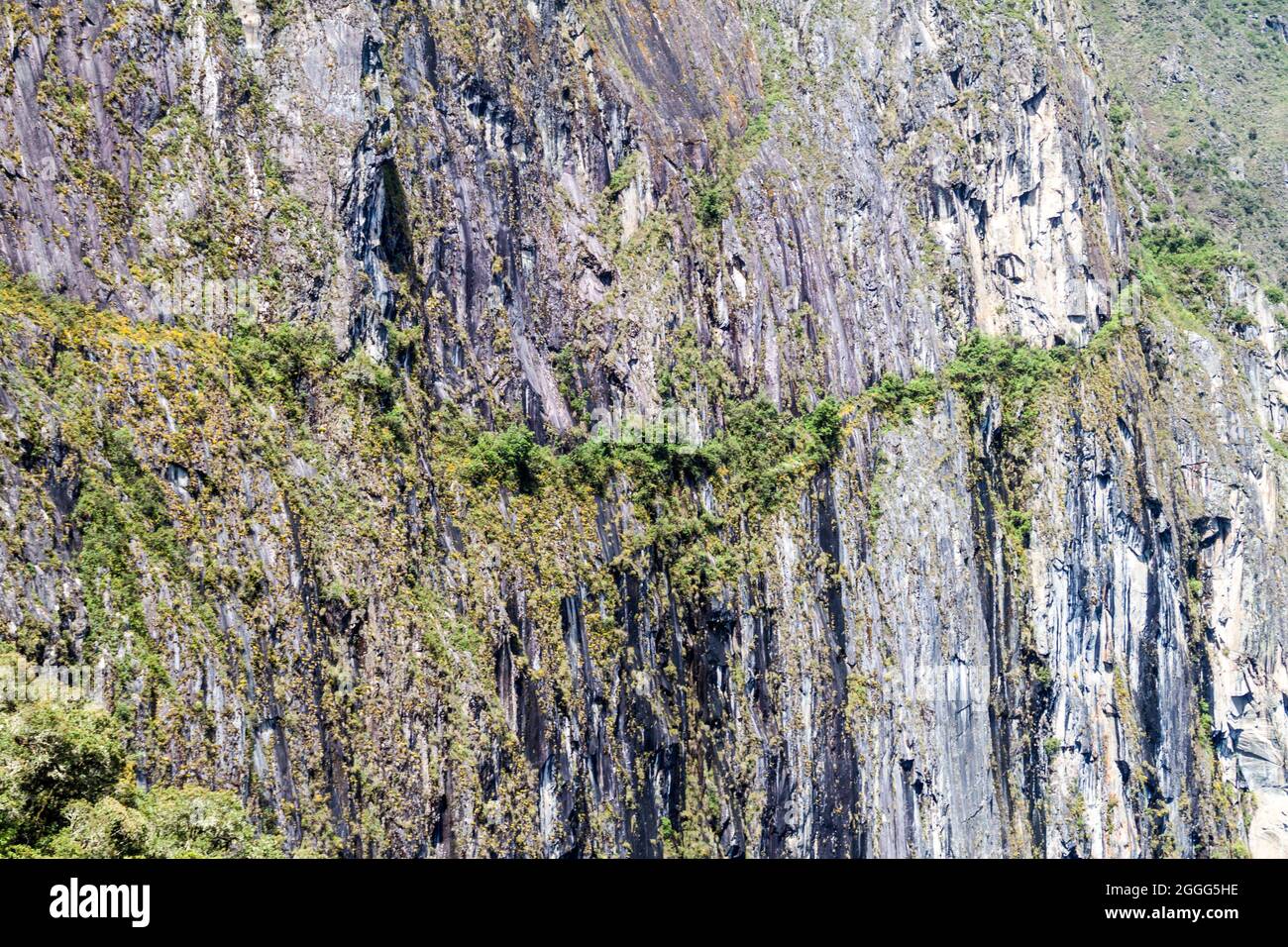 Inca trail carved into a stone wall near Machu Picchu ruins, Peru Stock ...