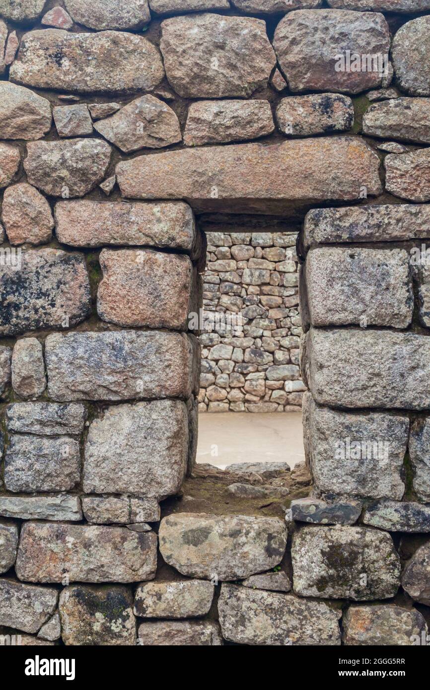 Window at House of Three Doorways at Machu Picchu ruins, Peru Stock ...