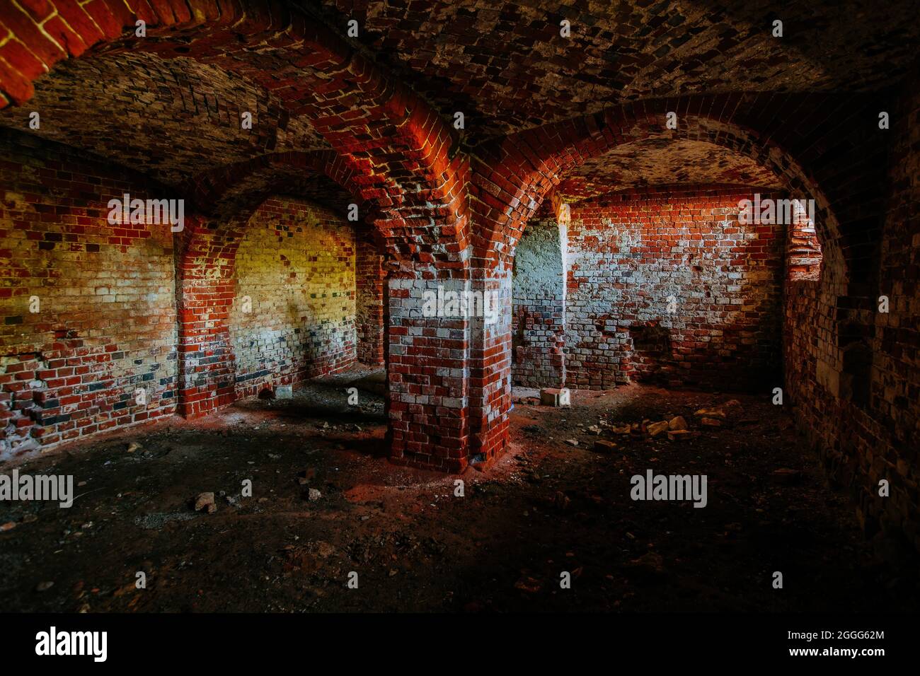 Vaulted red brick dungeon under old mansion Stock Photo - Alamy
