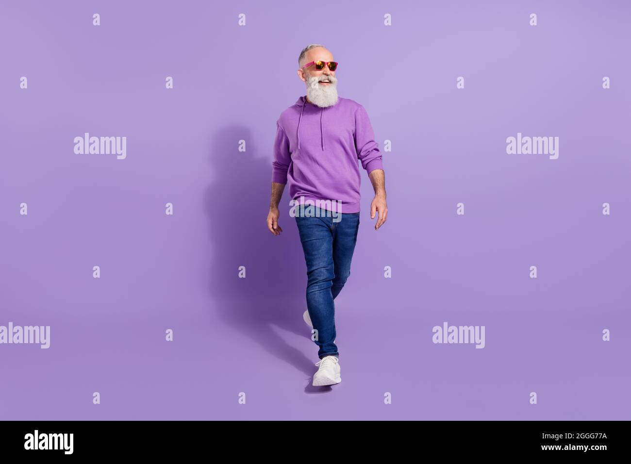 Full length body size view of attractive cheerful grey-haired man going ...