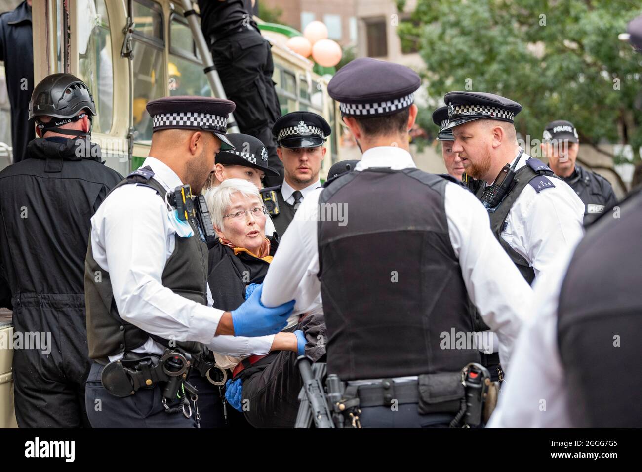 London, UK. 31st Aug, 2021. A protester is arrested and carried off of ...