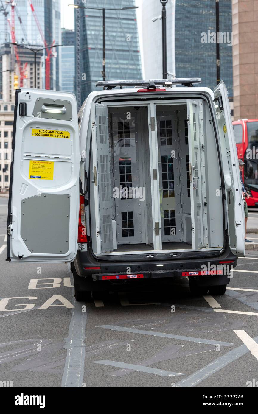 London, UK. 31st Aug, 2021. A police prisoner van waits for arrested ...