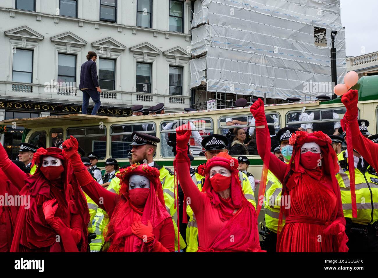 London, UK. 31st August 2021. Red Rebel Brigade faces the police ...