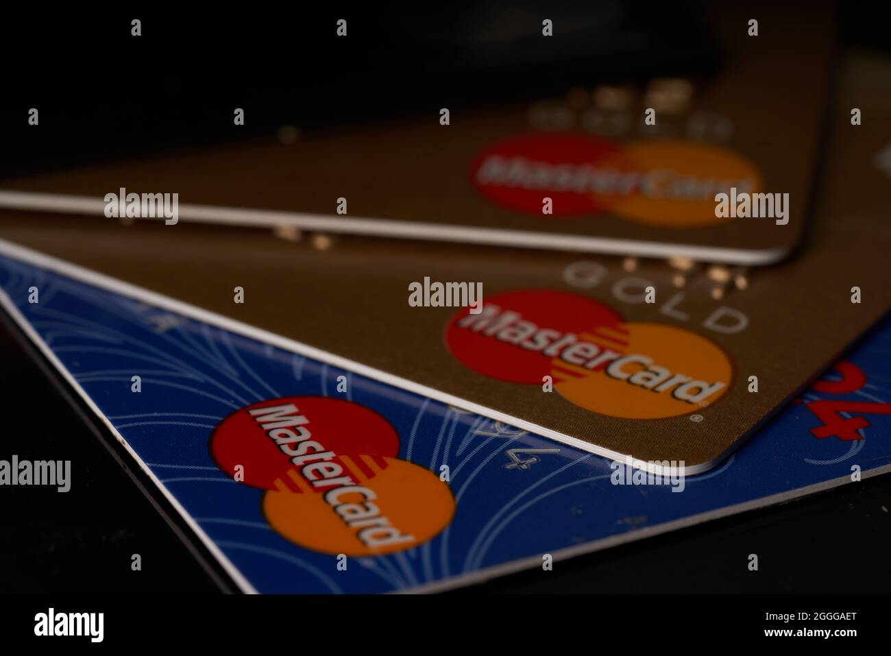 Stack of mastercard cards on black surface Stock Photo - Alamy