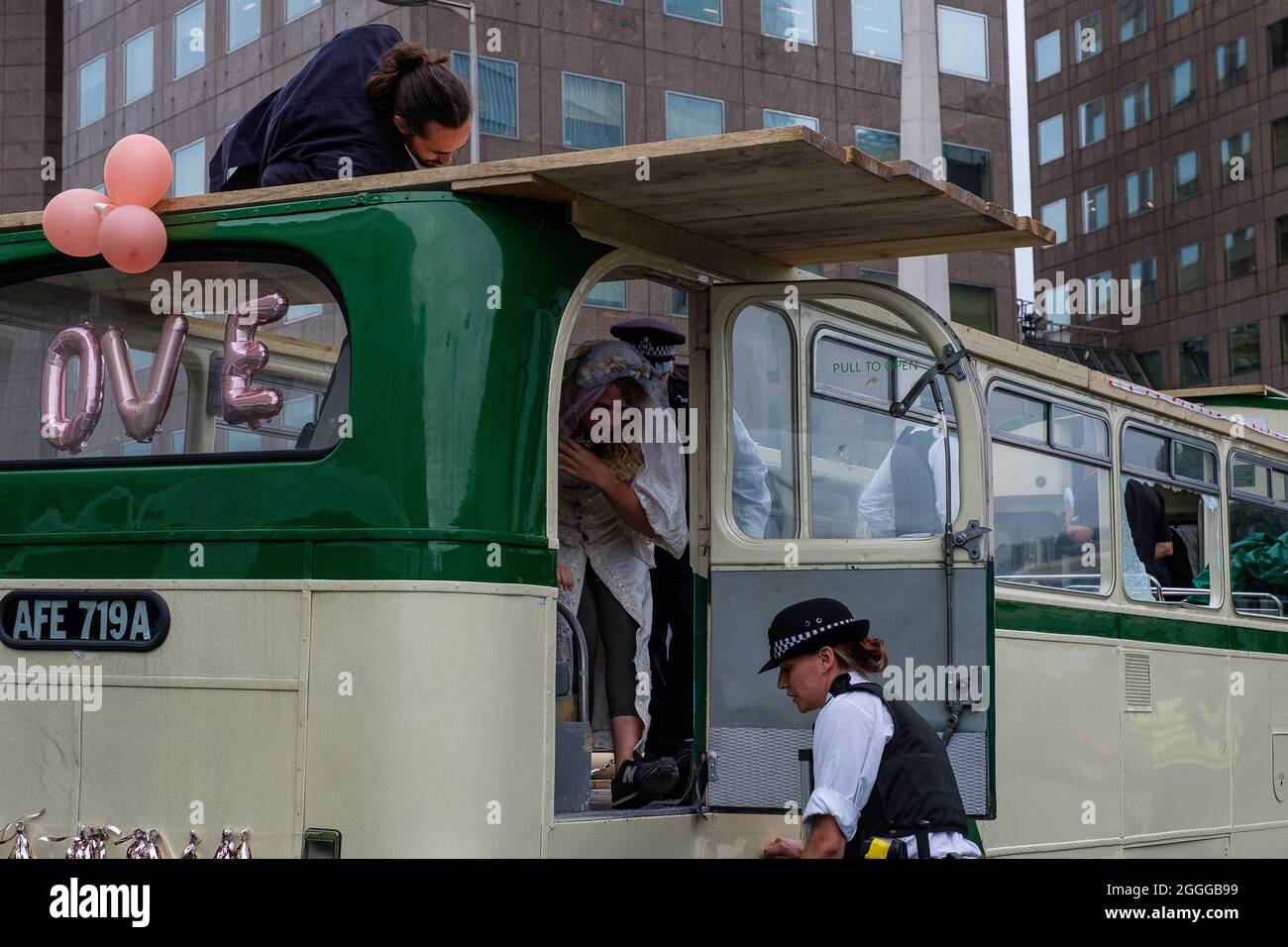London, UK. 31st August 2021. Bride getting arrested. Extinction ...
