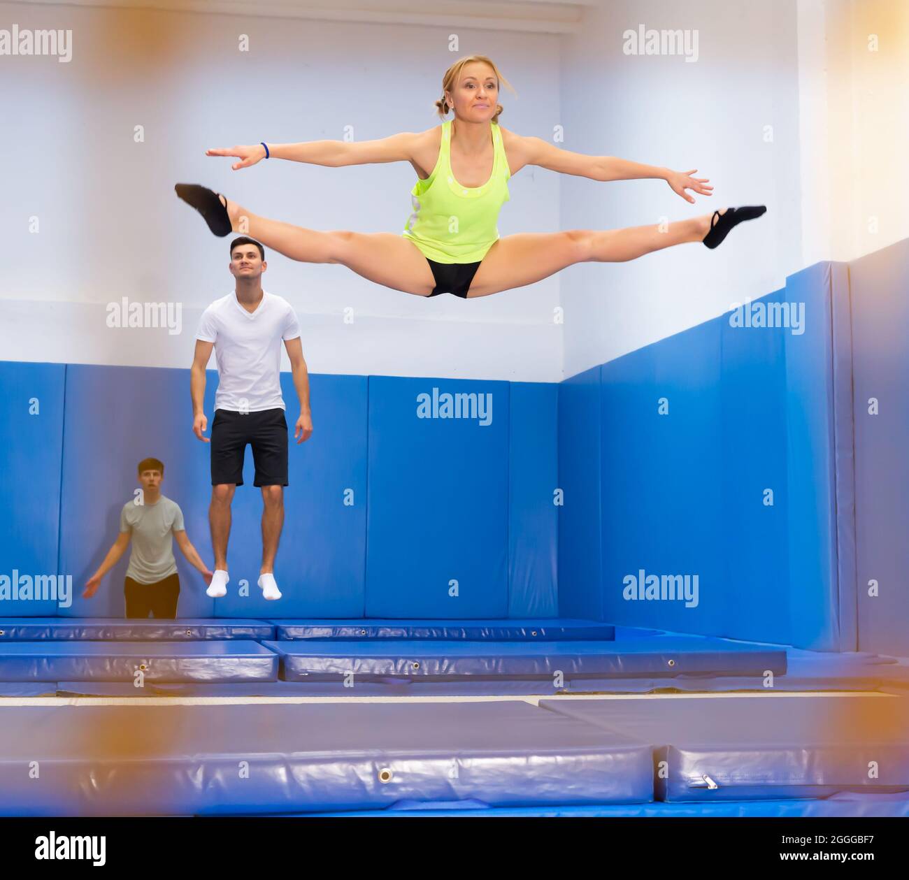 Aerial jumping young woman hi-res stock photography and images - Alamy