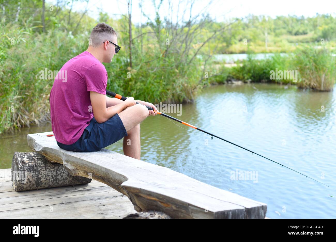Person looking at lake fish hi-res stock photography and images - Alamy