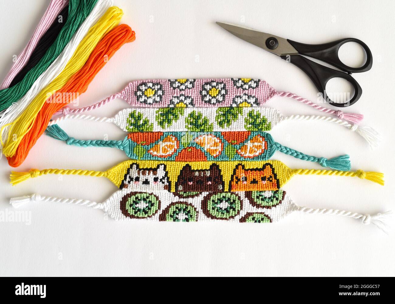 Woven DIY friendship bracelets handmade of embroidery floss with knots ...