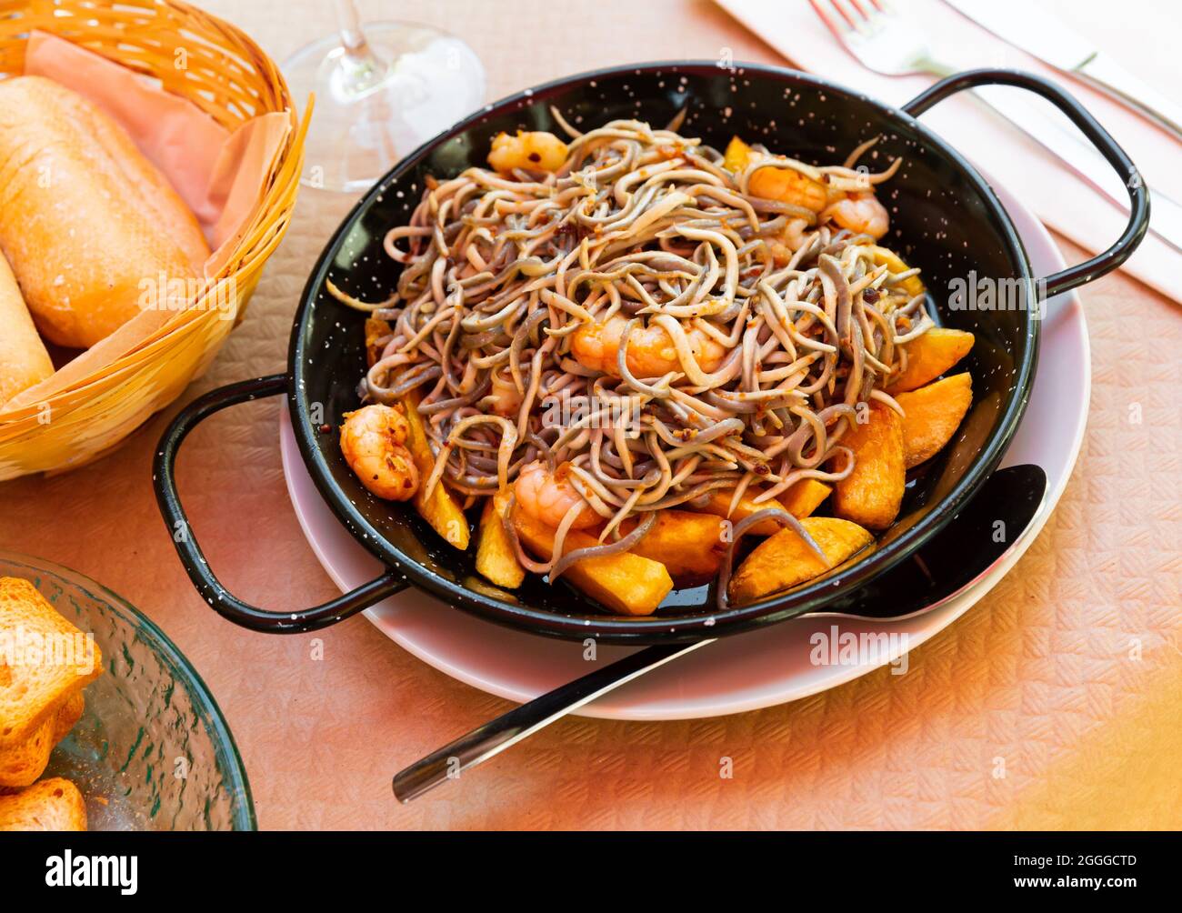 Surimi elvers with prawns and potato Stock Photo - Alamy