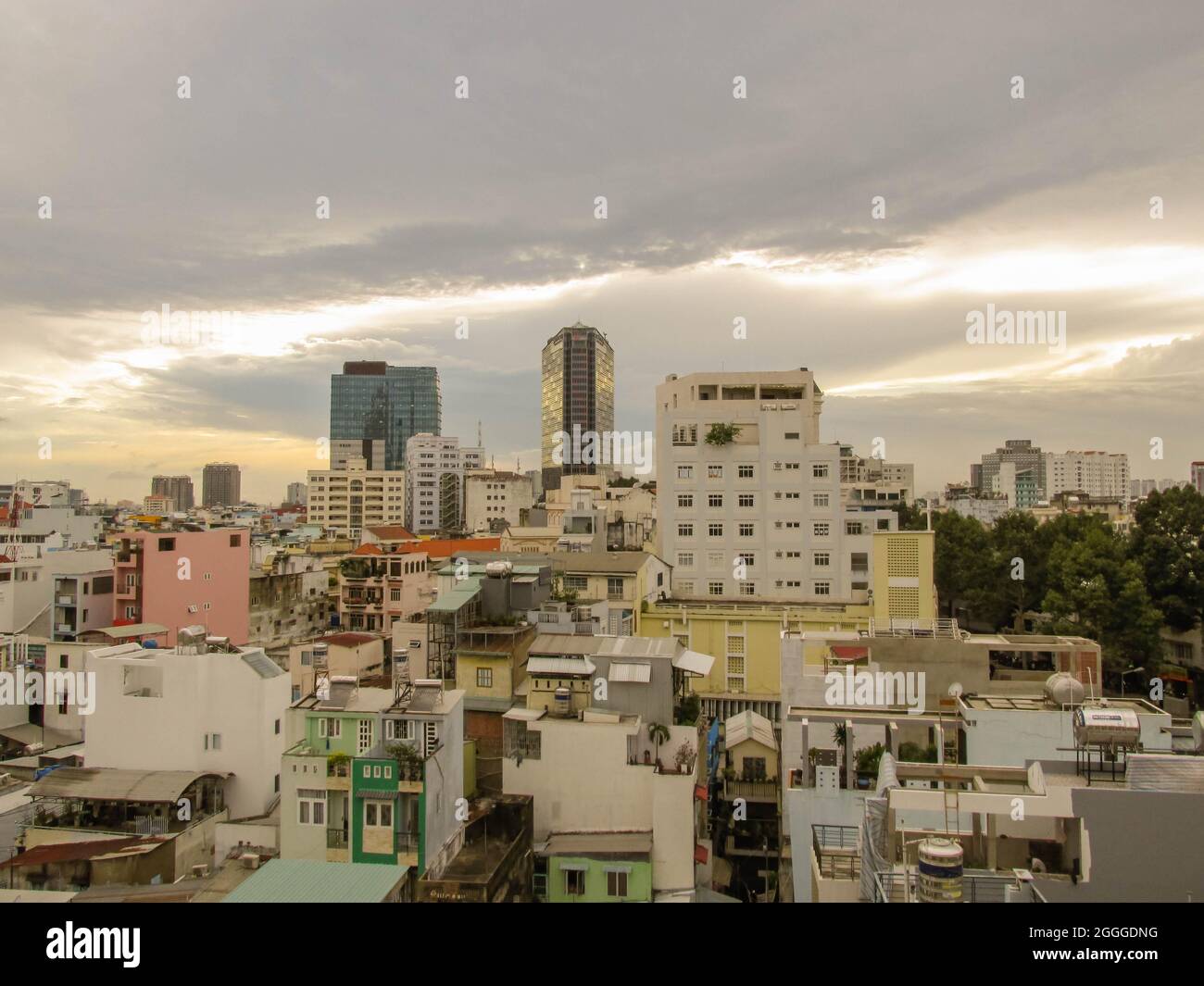 Landscape view of Ho Chi Minh city with crowd building in the sunset ...