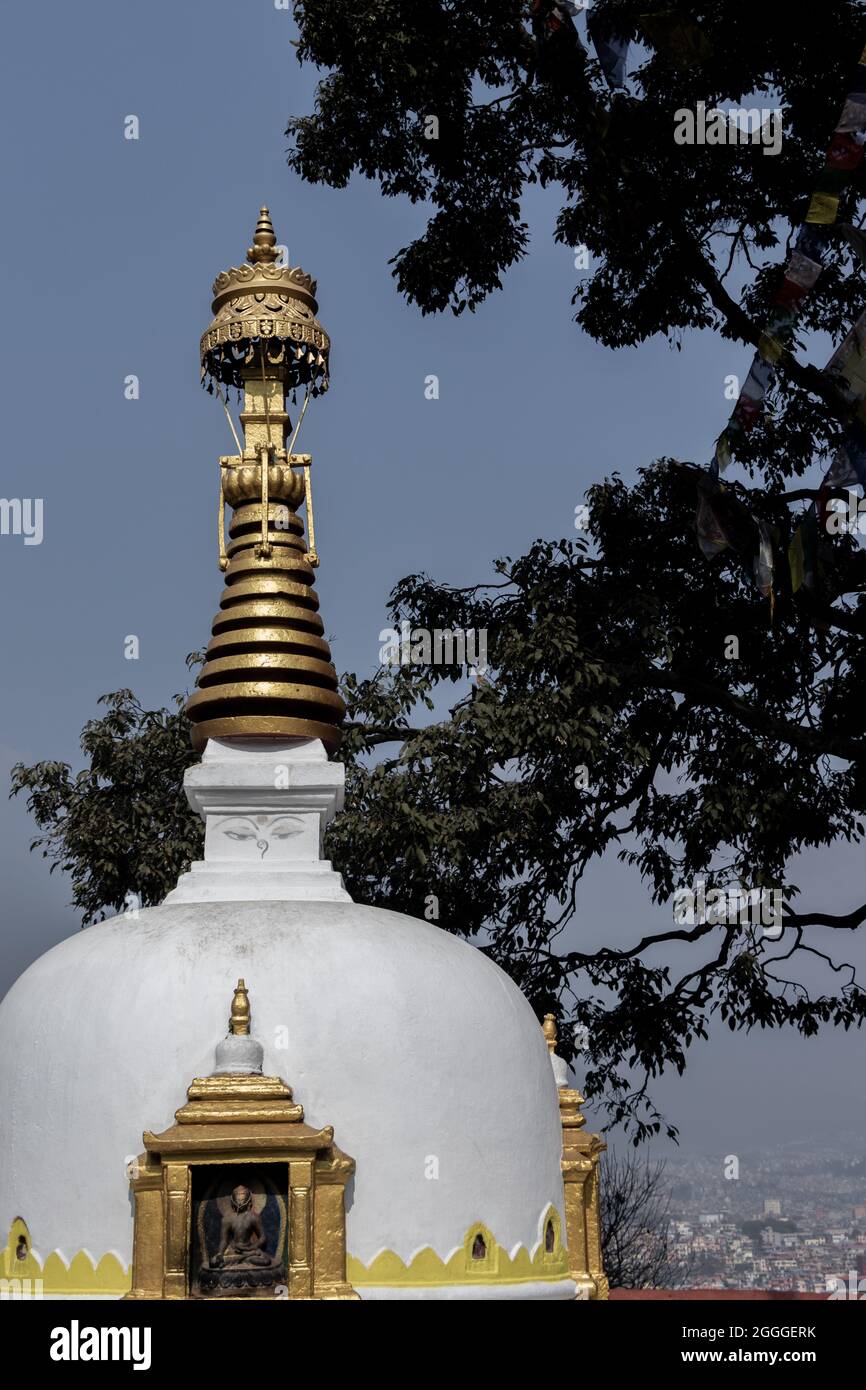 Small stupa and statue of Buddha at Swayambhunath, Kathmandu, Nepal ...