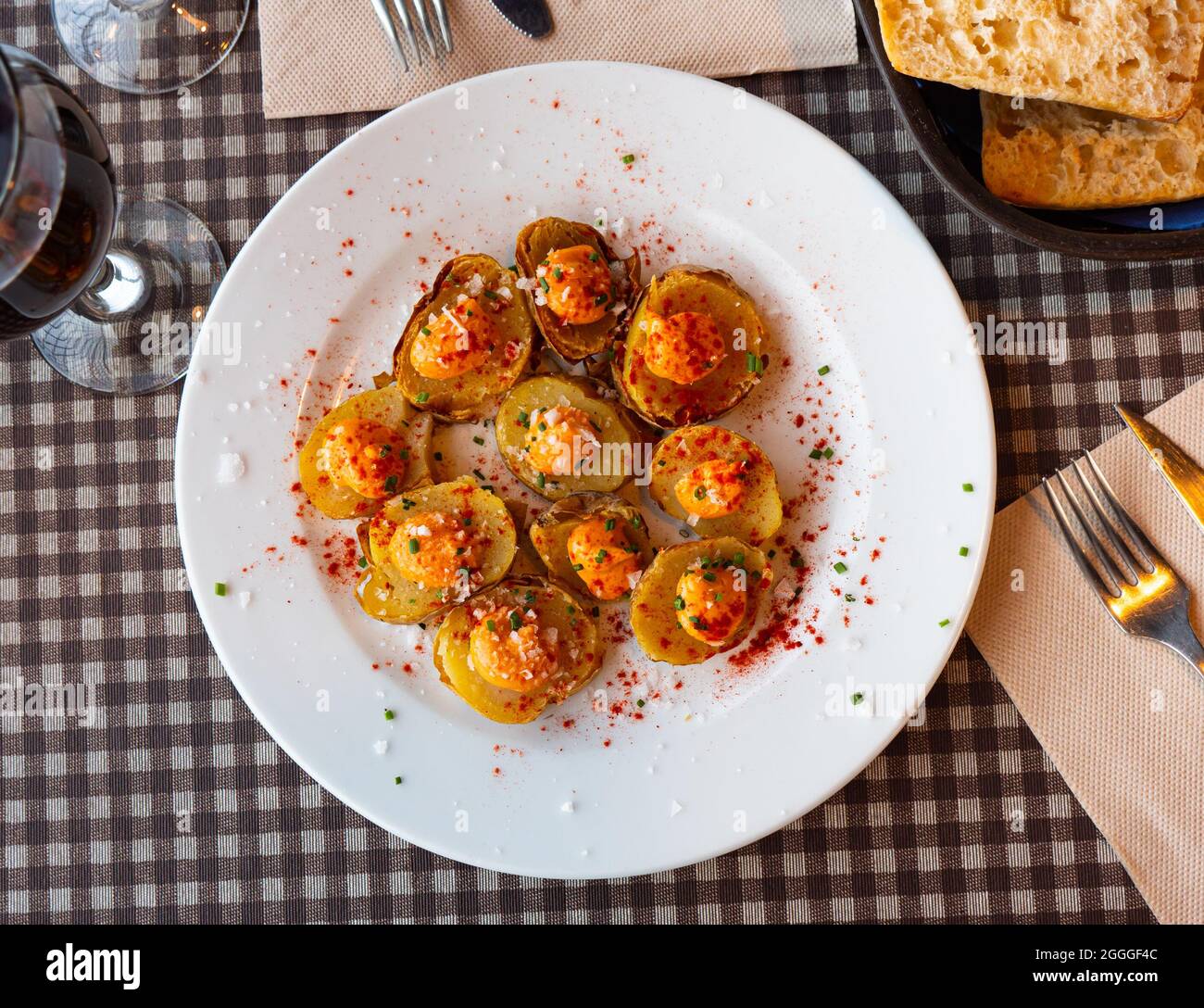 Spanish fried potatoes patatas bravas Stock Photo - Alamy