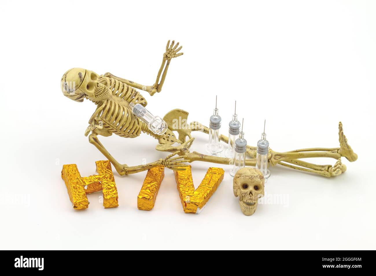 Still life concept human body bone ,skull bone ,syringe and A word HIV ...