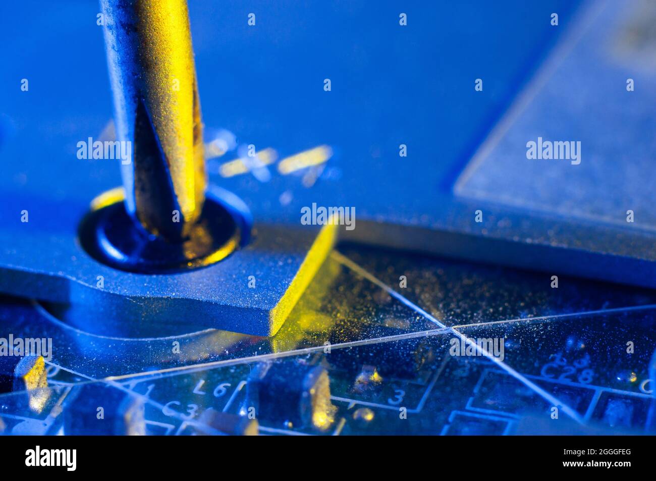 Computer disassembly process with a screwdriver close up Stock Photo ...