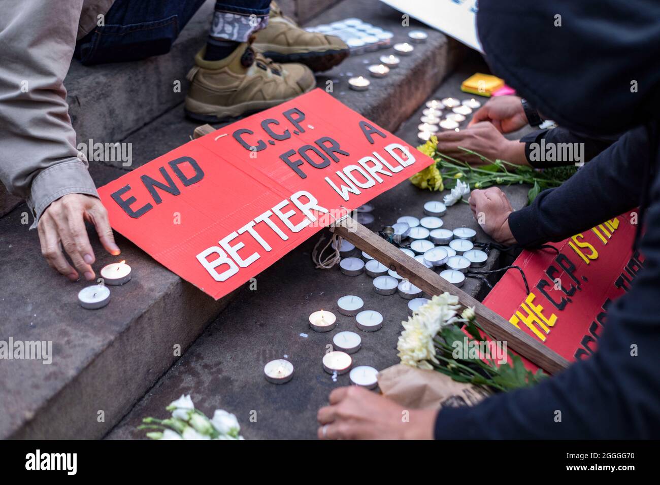 London, UK. 31st Aug, 2021. Protestors seen gathering candles around a ...