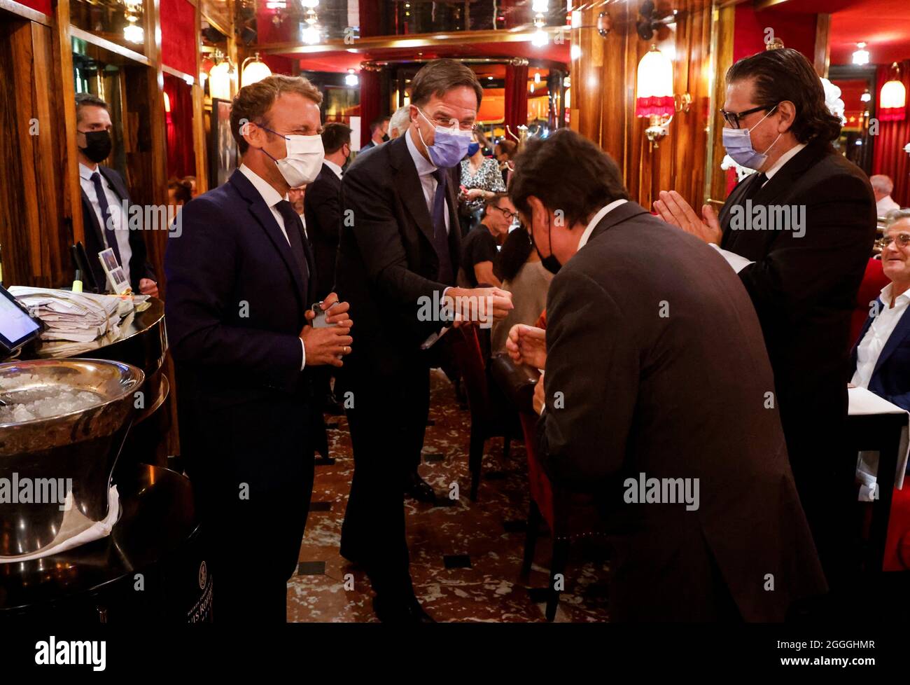 French President Emmanuel Macron (L) and outgoing Netherlands' Prime ...