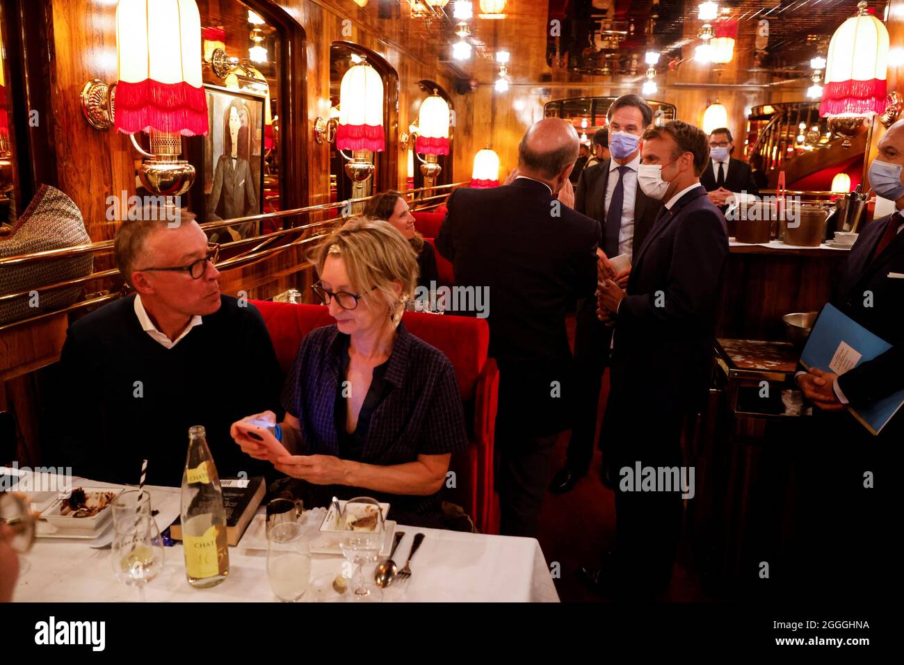 French President Emmanuel Macron (L) and outgoing Netherlands' Prime ...