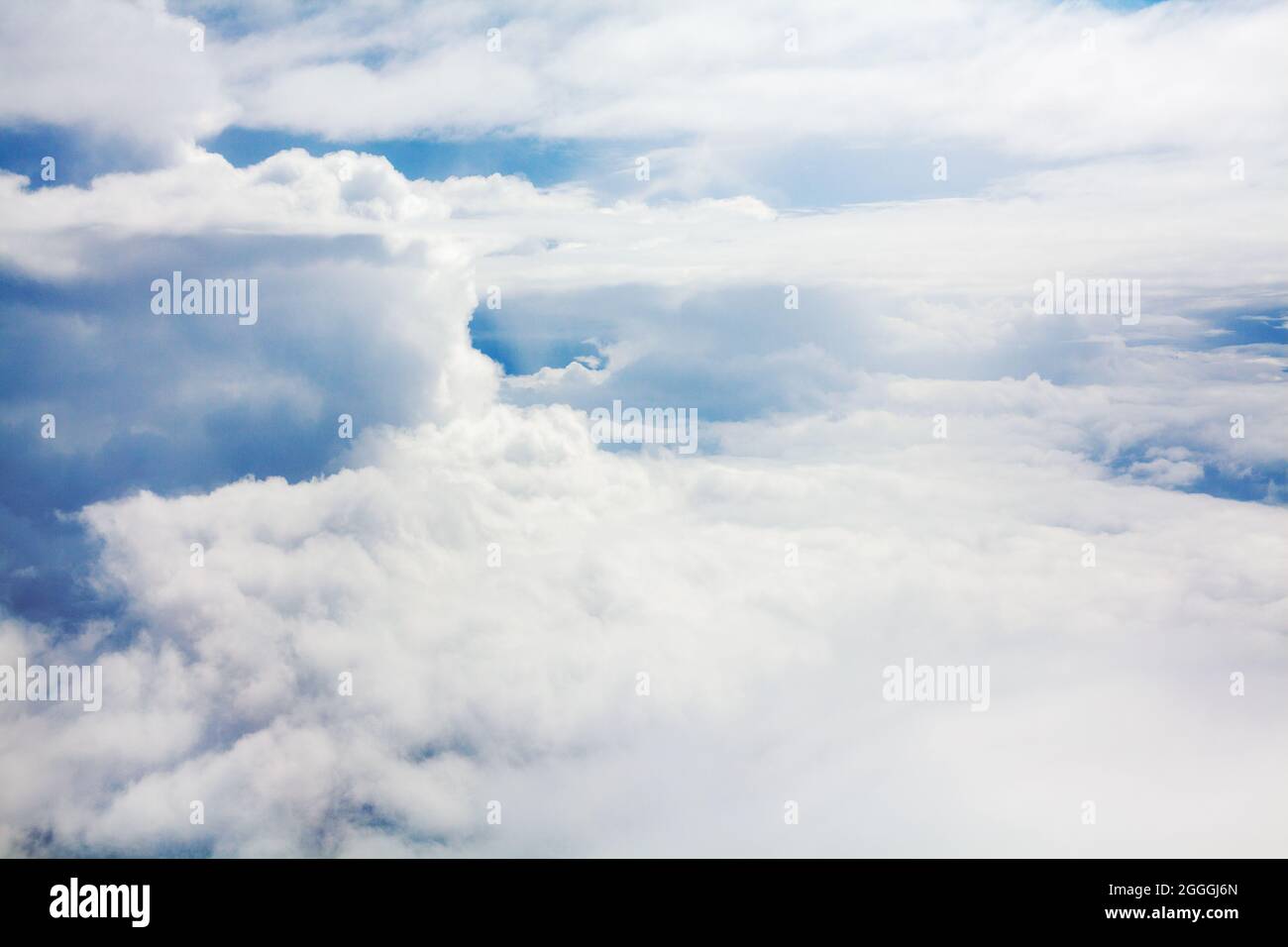 White clouds blue sky background view from above, airplane flight ...