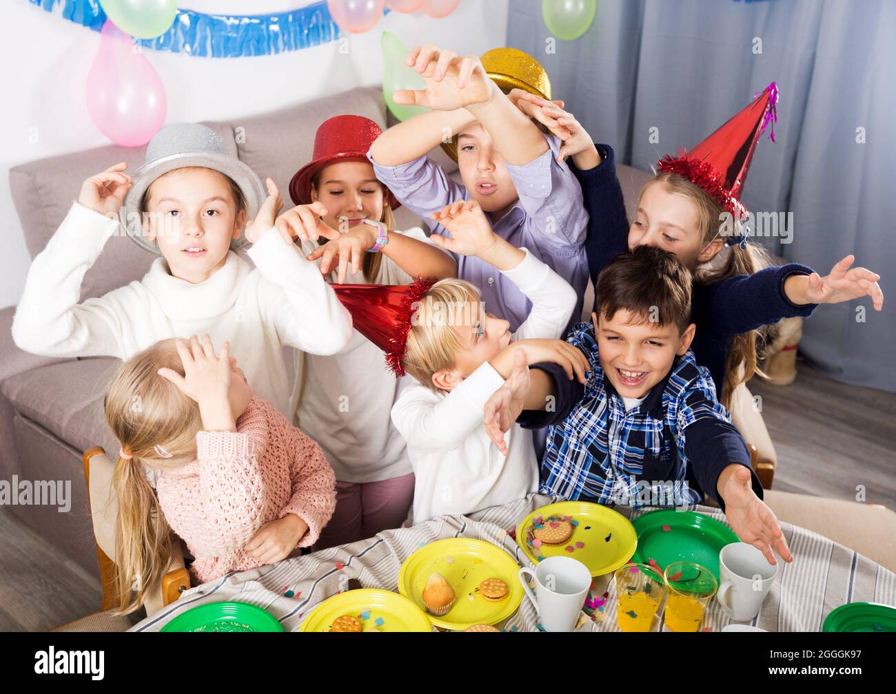 Children having fun during friend birthday party Stock Photo - Alamy