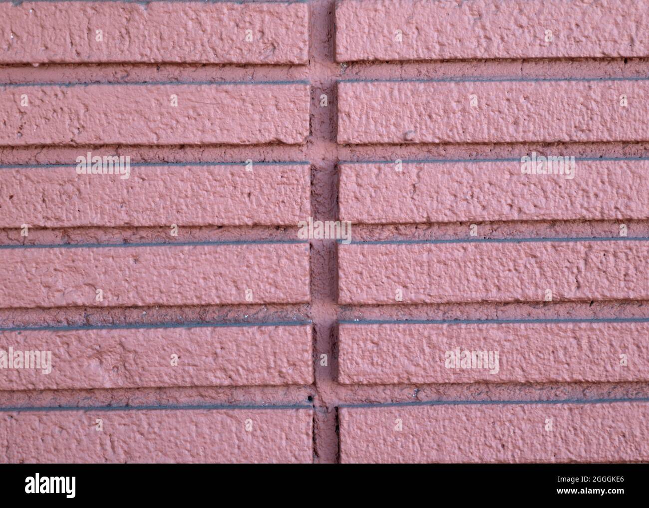 Pattern background of rows of pink bricks Stock Photo - Alamy